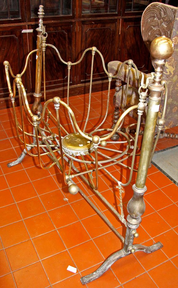 Bonhams : A brass framed cradle