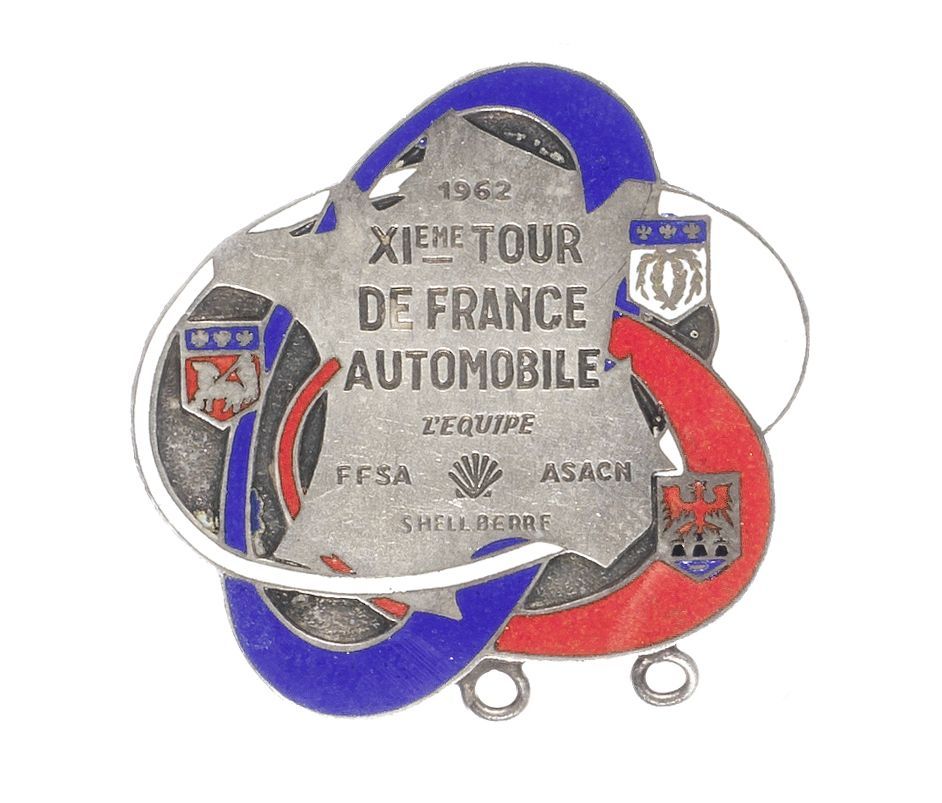 Bonhams Cars : A 1962 XI Tour de France Automobile enamel lapel badge,