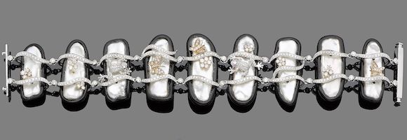 Bonhams : An onyx, cultured pearl, ruby and diamond bracelet