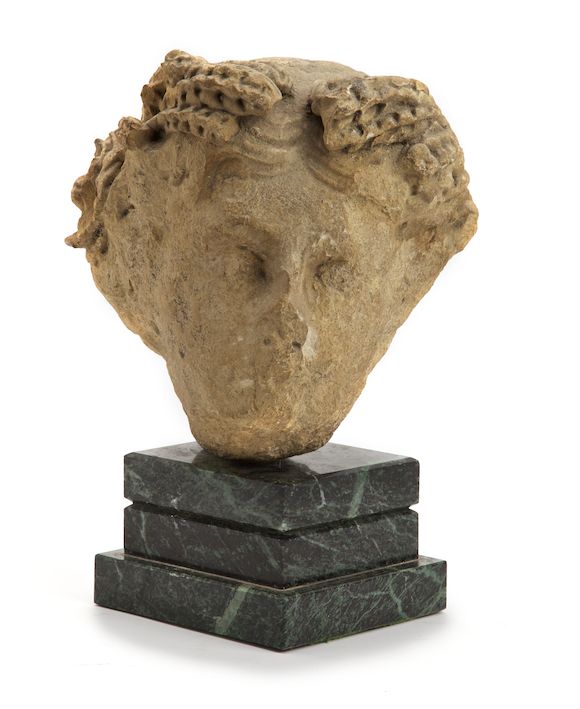 Bonhams : A Roman limestone female headCirca 2nd century A.D.