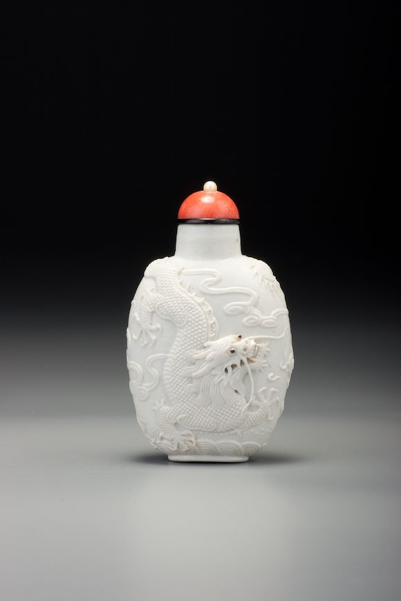Bonhams : A carved white porcelain 'dragons' snuff bottle Li Yucheng ...