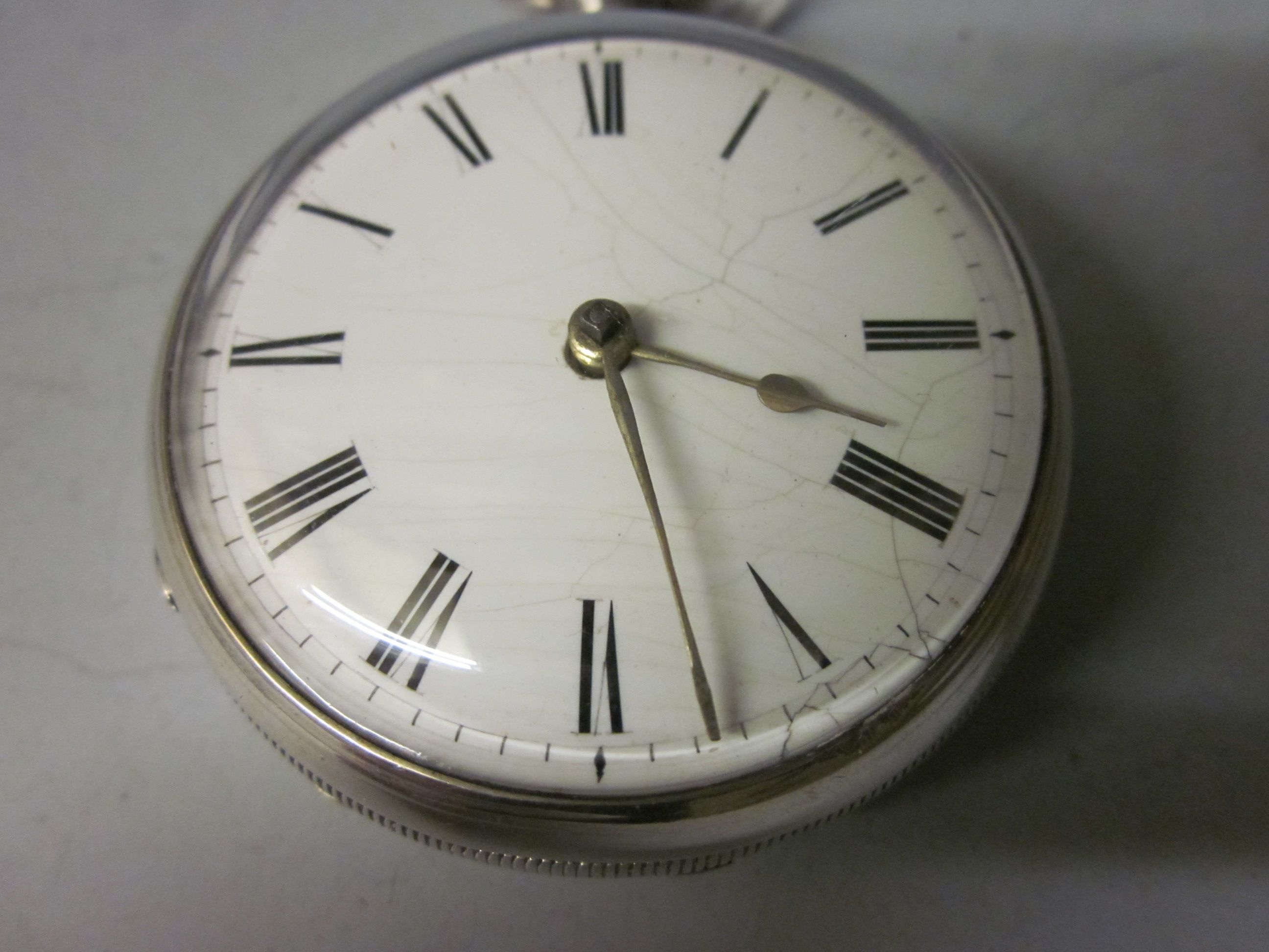 Bonhams : A silver open faced key wound pocket watch,