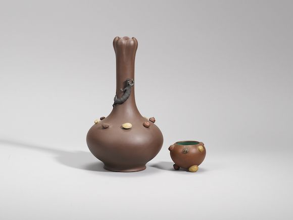 Bonhams : A Yixing stoneware 'fruits' vase and a small 'nuts' waterpot ...