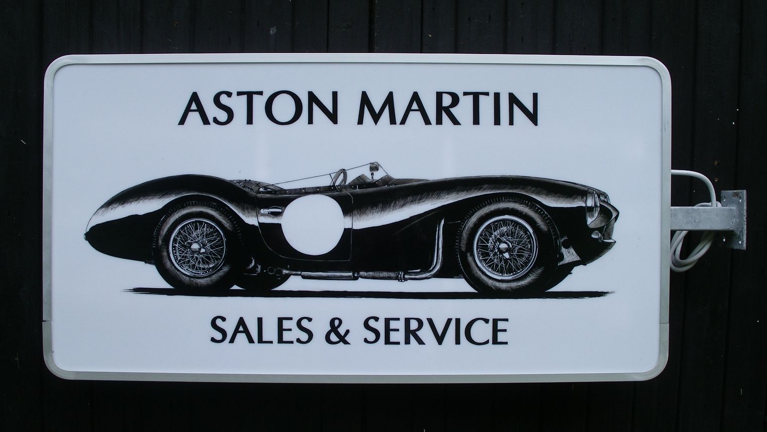 Bonhams Cars : An 'Aston Martin Sales And Service' light box,
