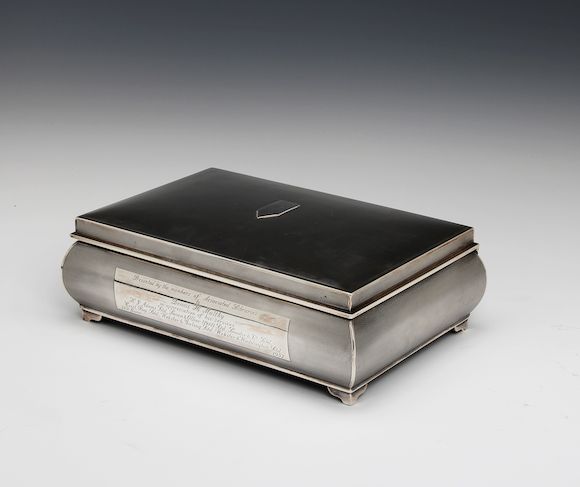 Bonhams : A silver rectangular engine-turned presentation cigar box by ...