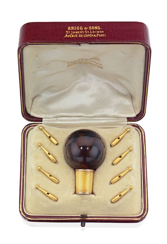 Bonhams : An early 20th century tortoiseshell and enamel parasol handle
