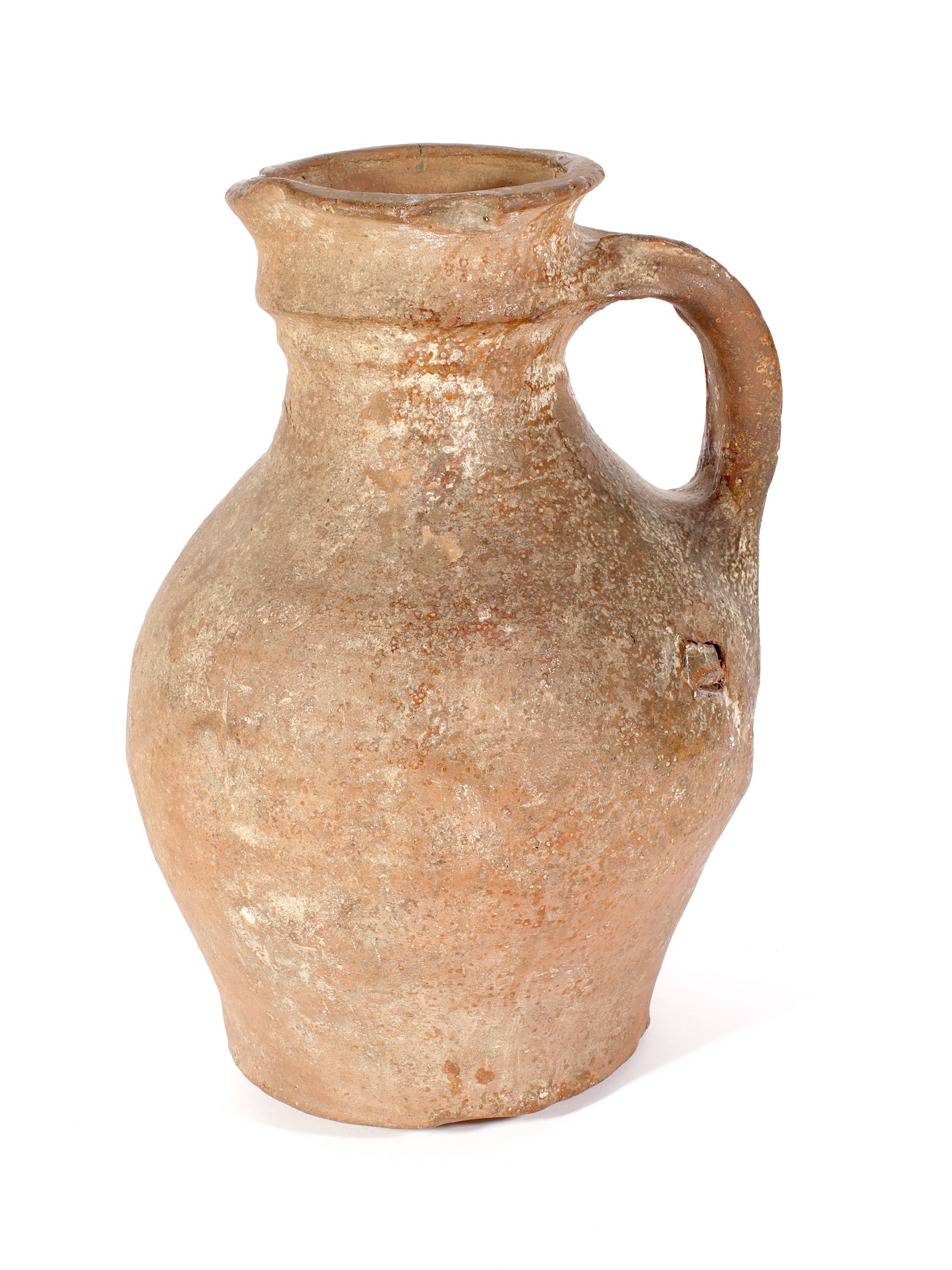 Bonhams : An English medieval jug, 14th century