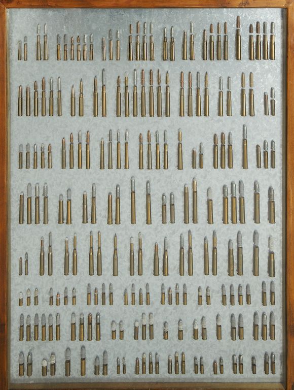 Bonhams : An unusual cartridge-display board of Remington cartridges