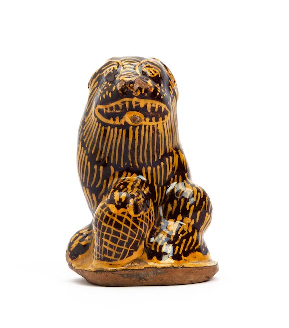 Bonhams : A Flemish slipware lion Late 18th century