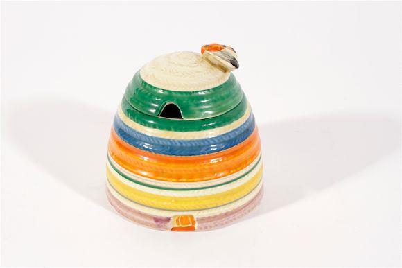 Bonhams : A Clarice Cliff Bizarre skep form honey pot and cover