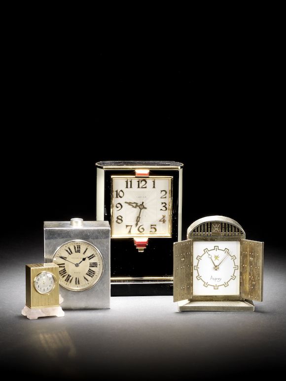 Bonhams : A fine 18 carat gold rose quartz miniature timepiece Geneva ...