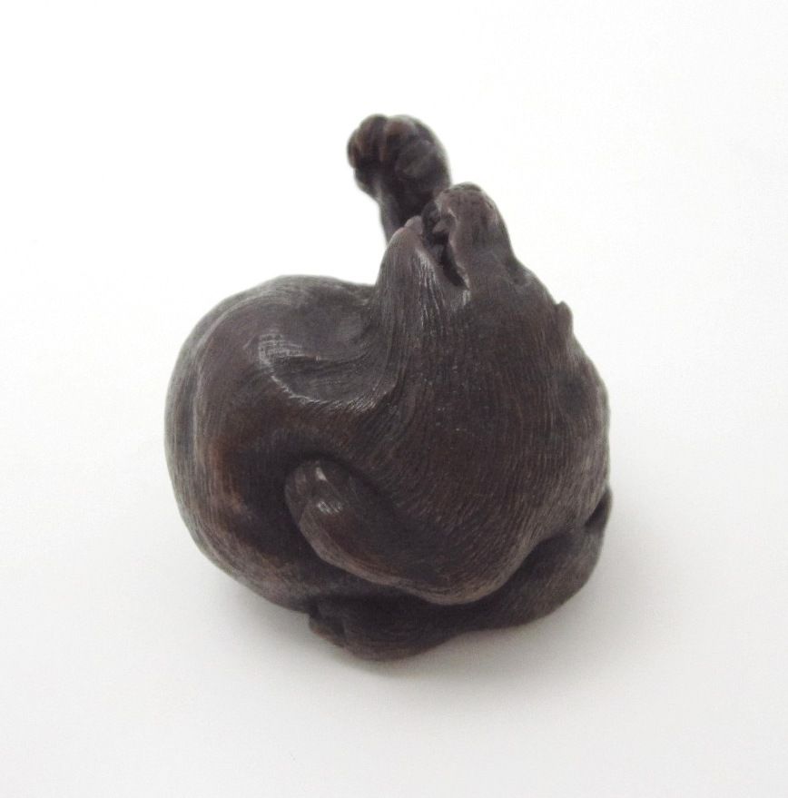 Bonhams : A rare carved wood netsuke 19th century