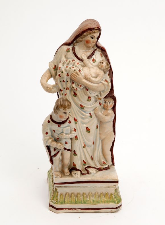 Bonhams : A Staffordshire pearlware figure group of Charity 19th Century