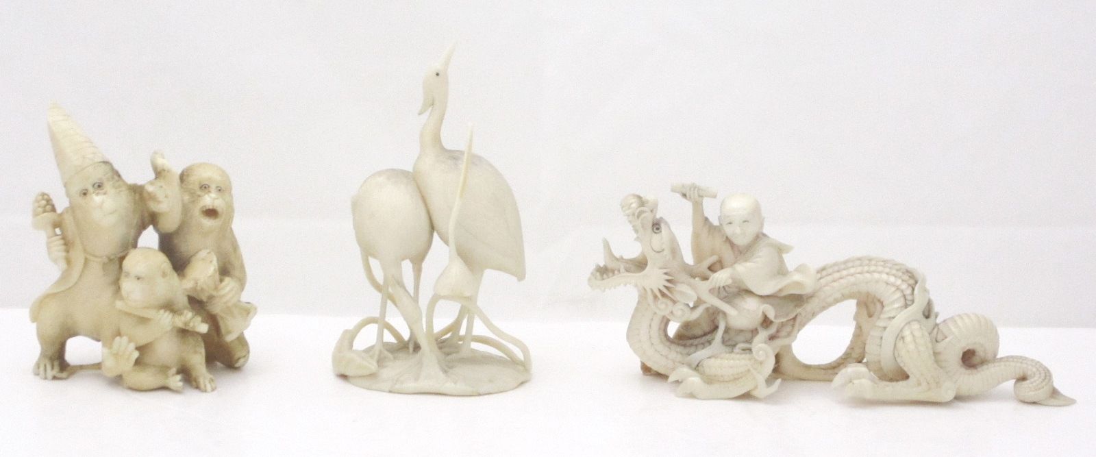 Bonhams : Three small marine ivory animal groups Japanese, Meiji, the ...
