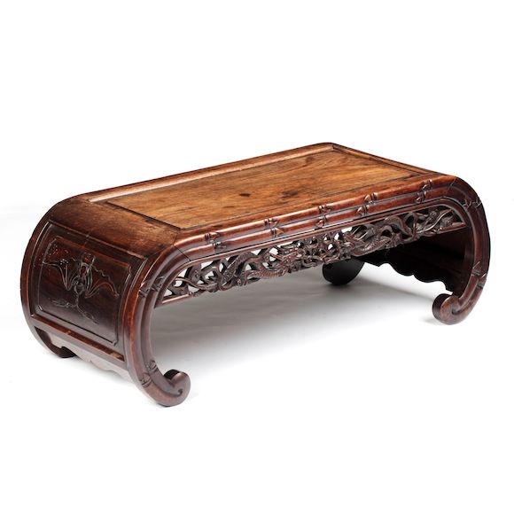 Bonhams : A carved hardwood scroll table 20th century