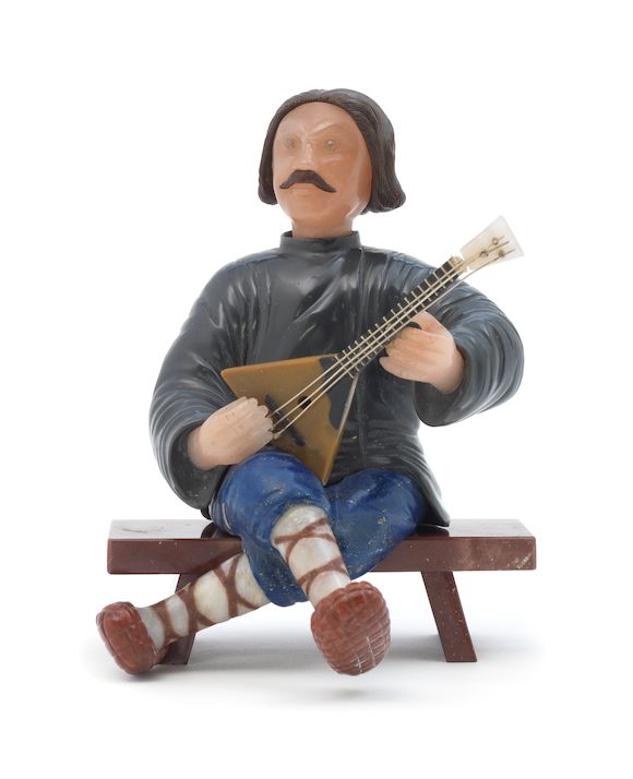 Bonhams : A hardstone model of a balalaika player unmarked