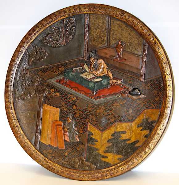 Bonhams : A pair of Japanese pottery large bas relief wall plates ...