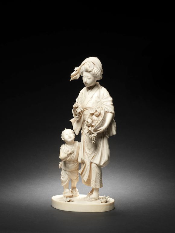Bonhams : An ivory okimono group of a bijin and child By Yoshiaki/Ryomei, Meiji Period