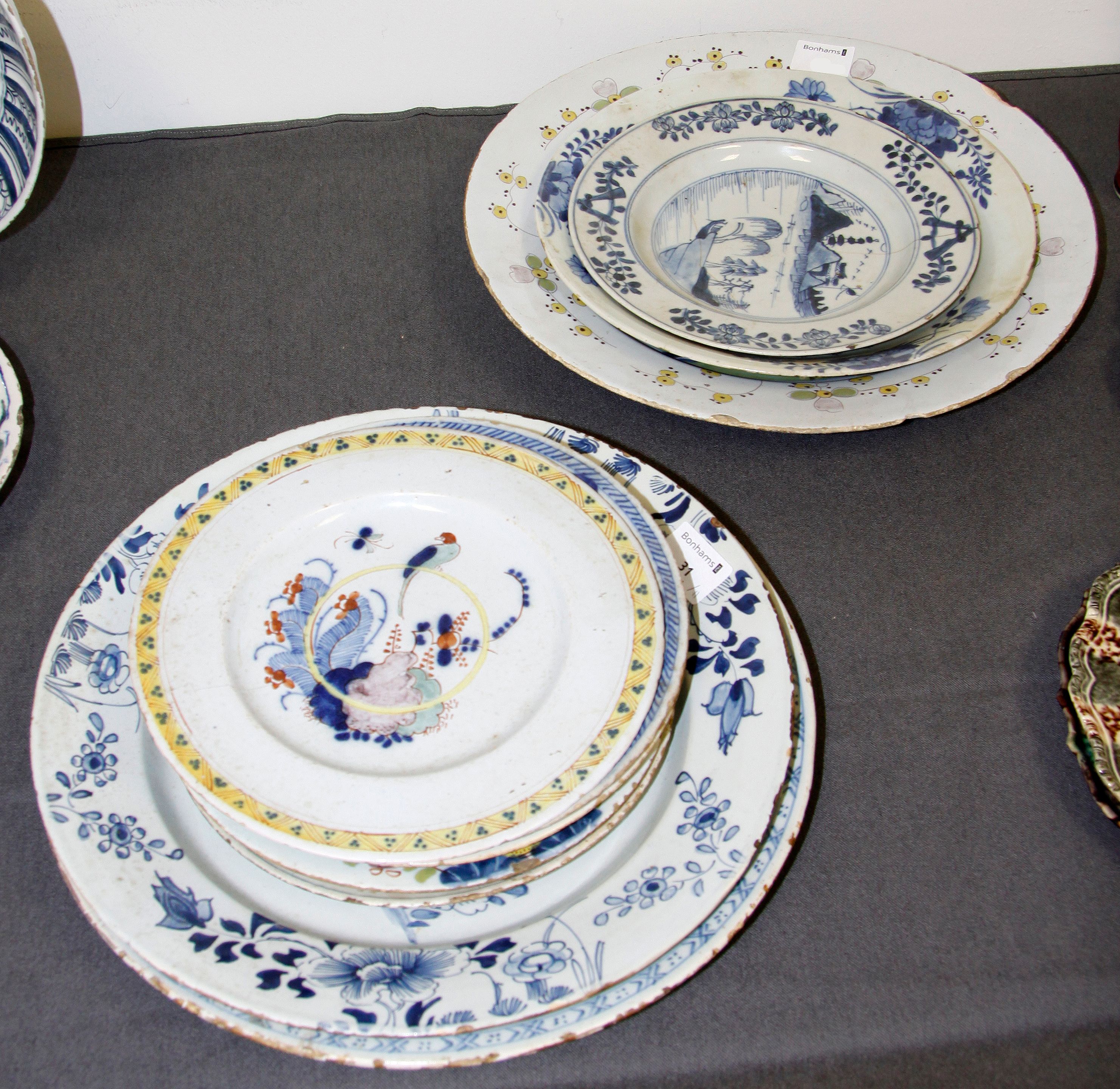 Bonhams : An English delft plate, eight other delft plates and two ...