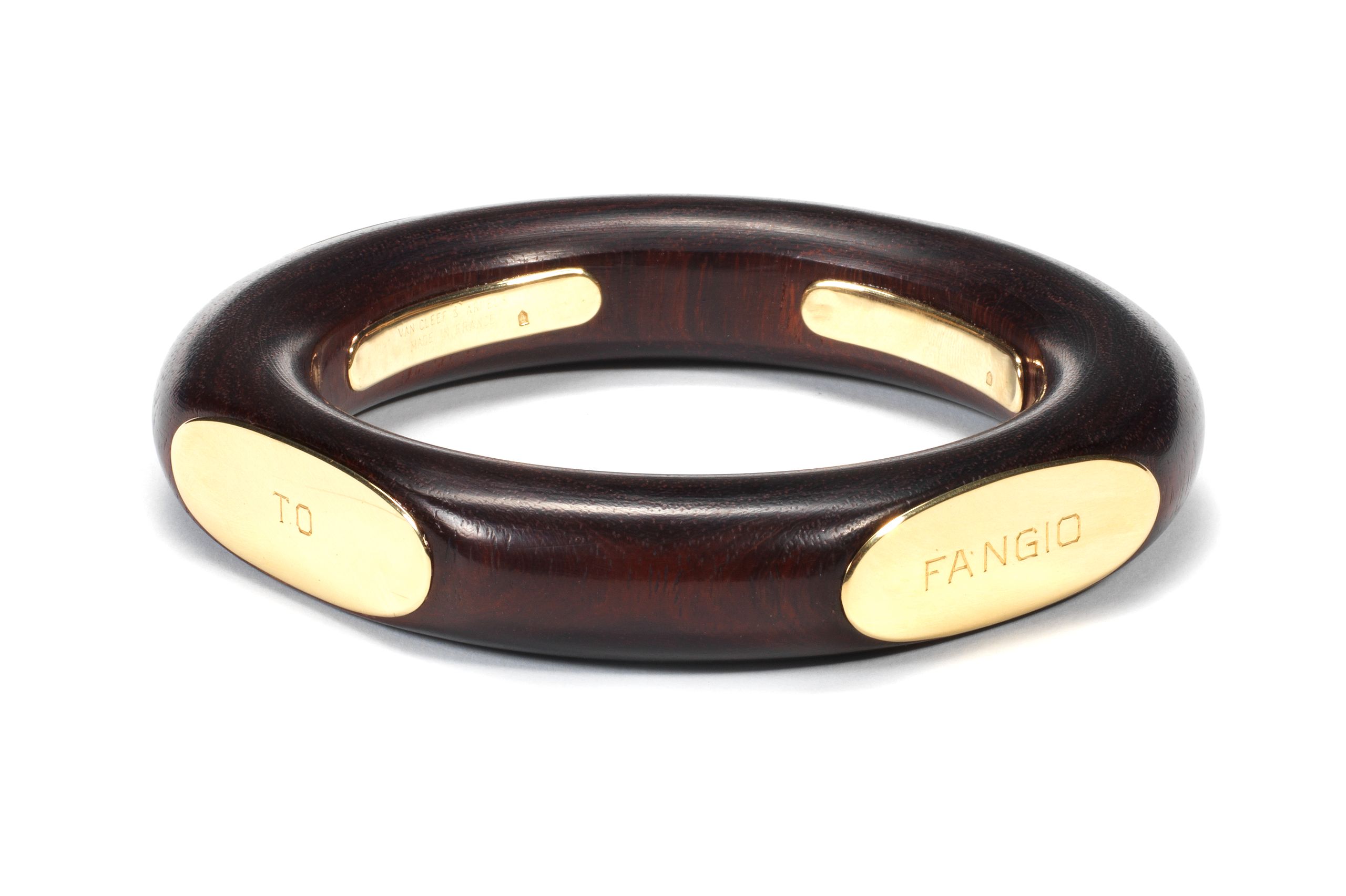 Bonhams Cars : A fine wood and gold bangle by Van Cleef & Arples ...
