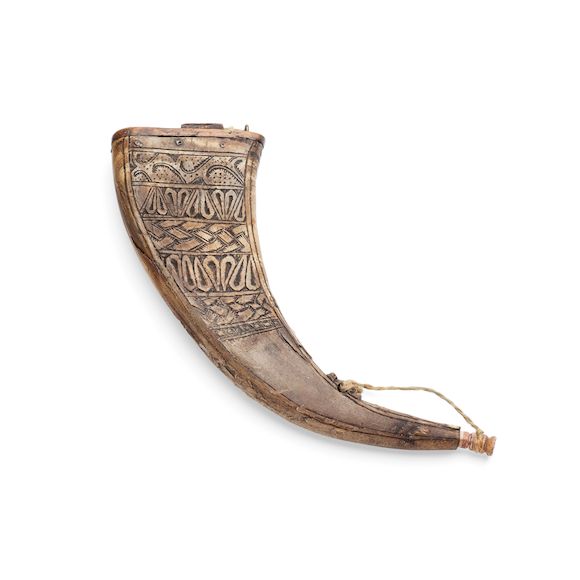 Bonhams : A Scottish cow horn powder flask, probably 19th century