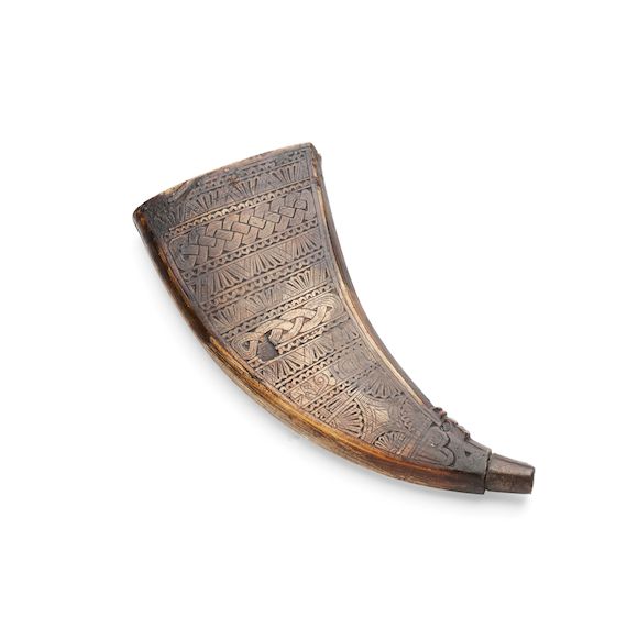 Bonhams : A 17th century Scottish flattened cow horn powder flask