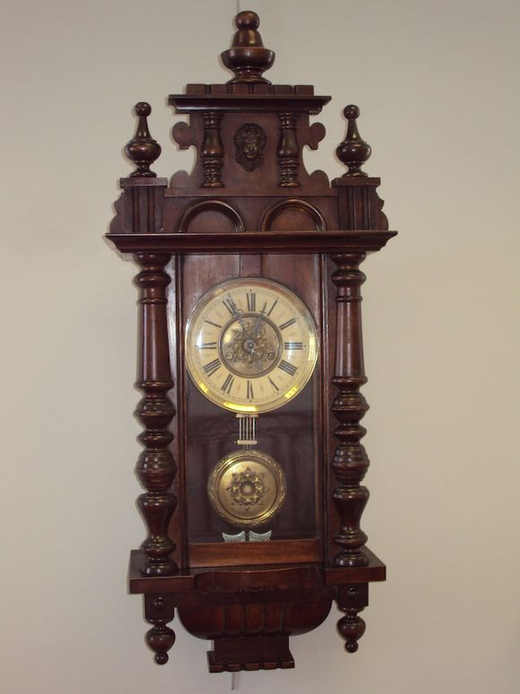 Bonhams : A small walnut-cased Vienna-style wall clock