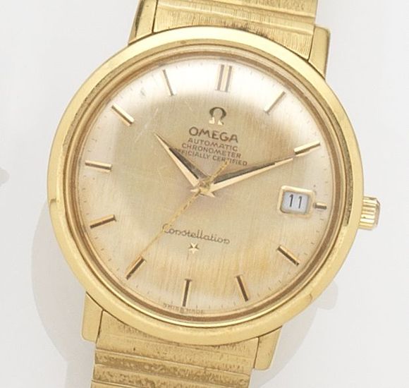 Bonhams : Omega. An 18ct gold automatic calendar bracelet ...