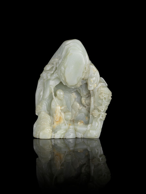 Bonhams : A fine pale green jade carving of a luohan in a grotto 17th ...