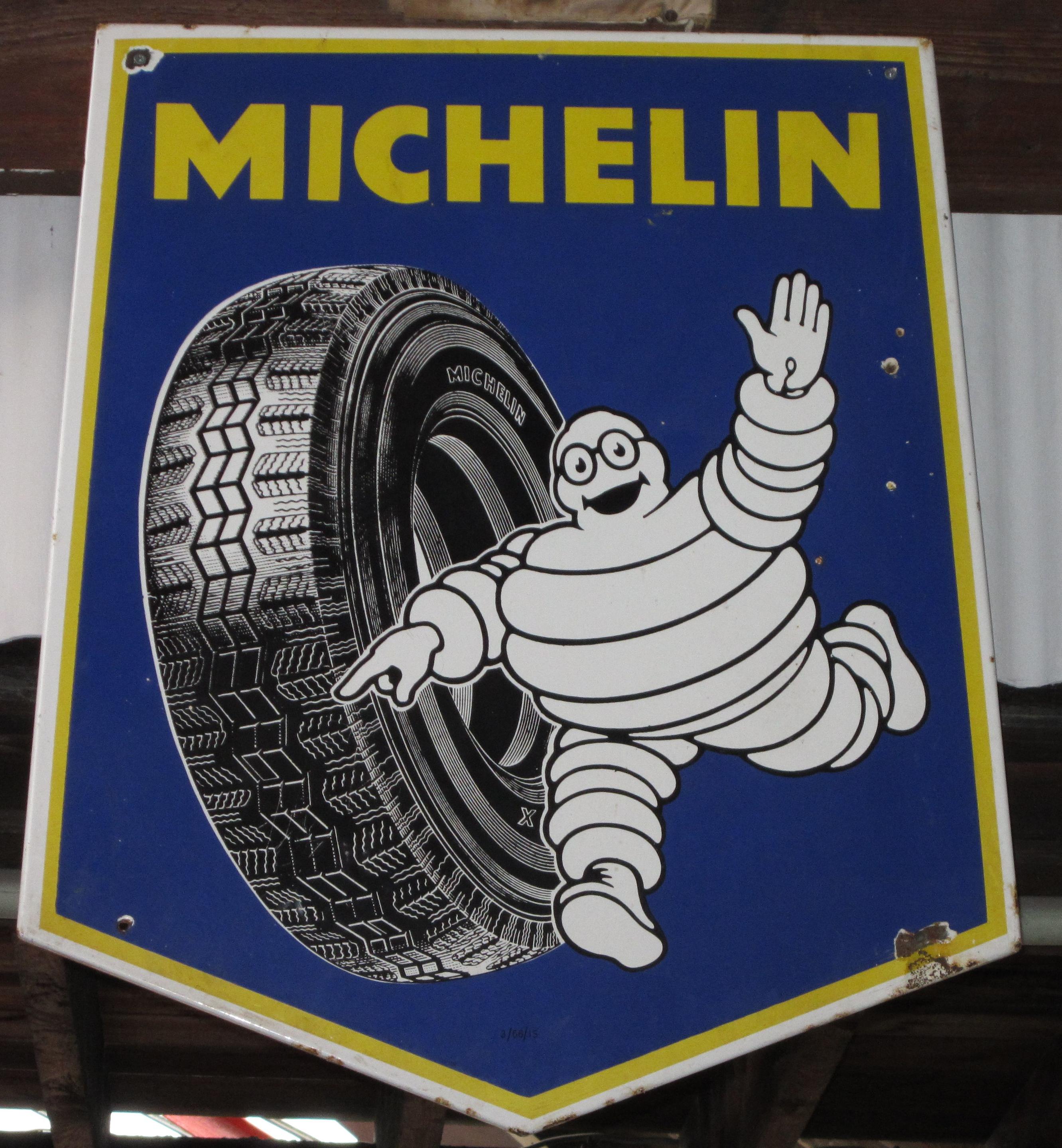Bonhams Cars : Two shield-shaped Michelin enamel signs,