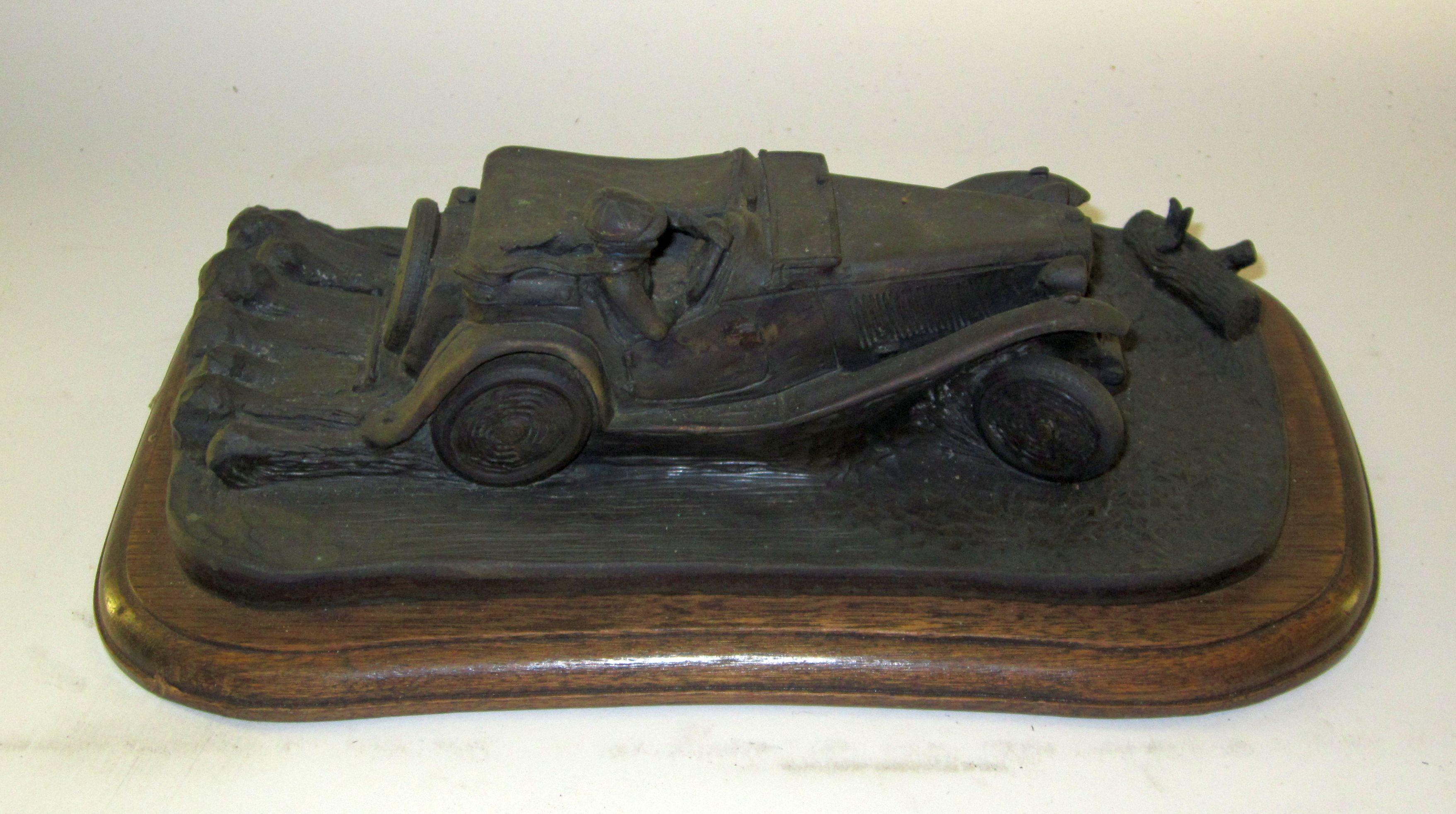 Bonhams Cars : An MG TC bronze sculpture by Chris Davis,