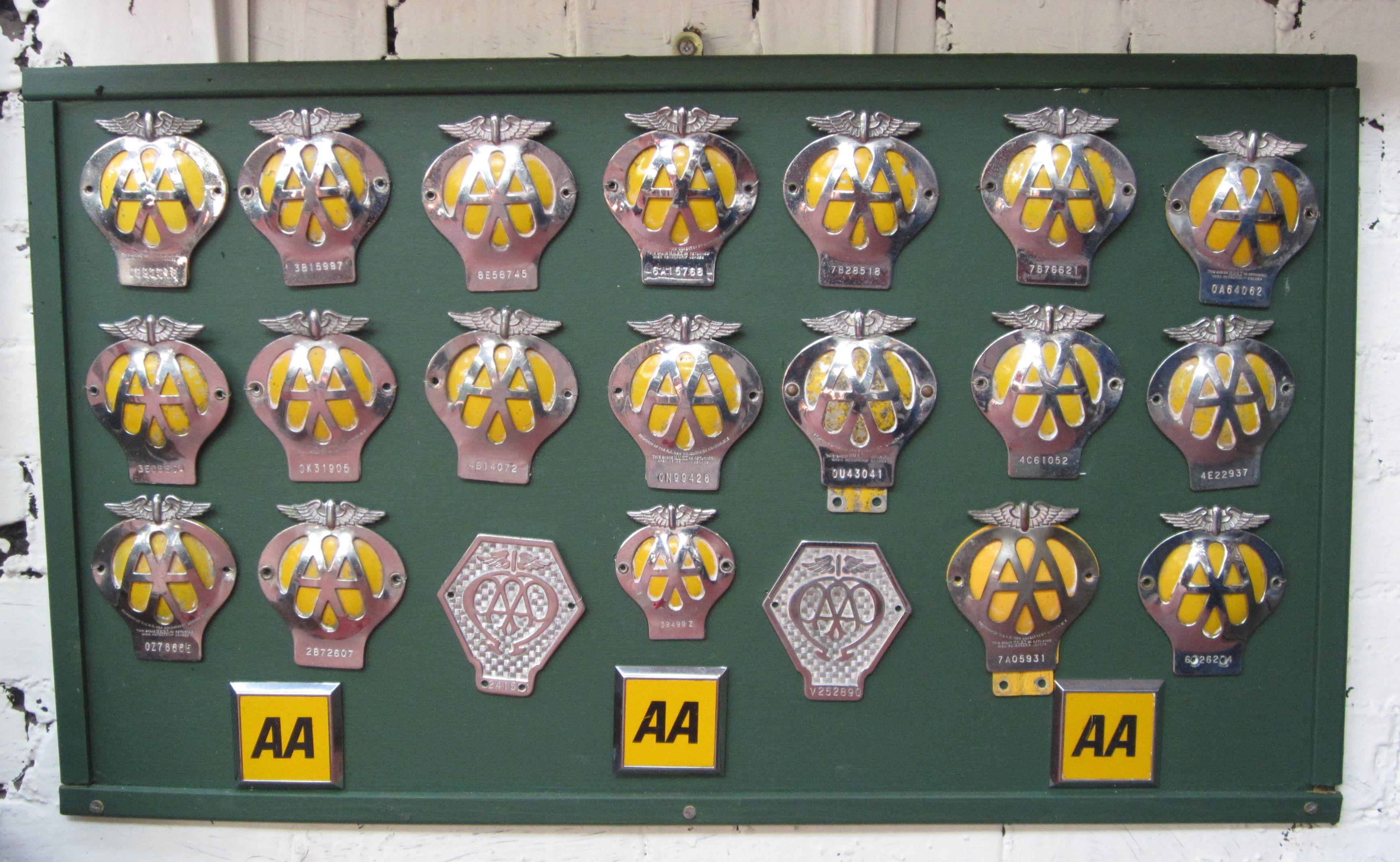 Bonhams Cars : A framed display of Automobile Association member's badges,