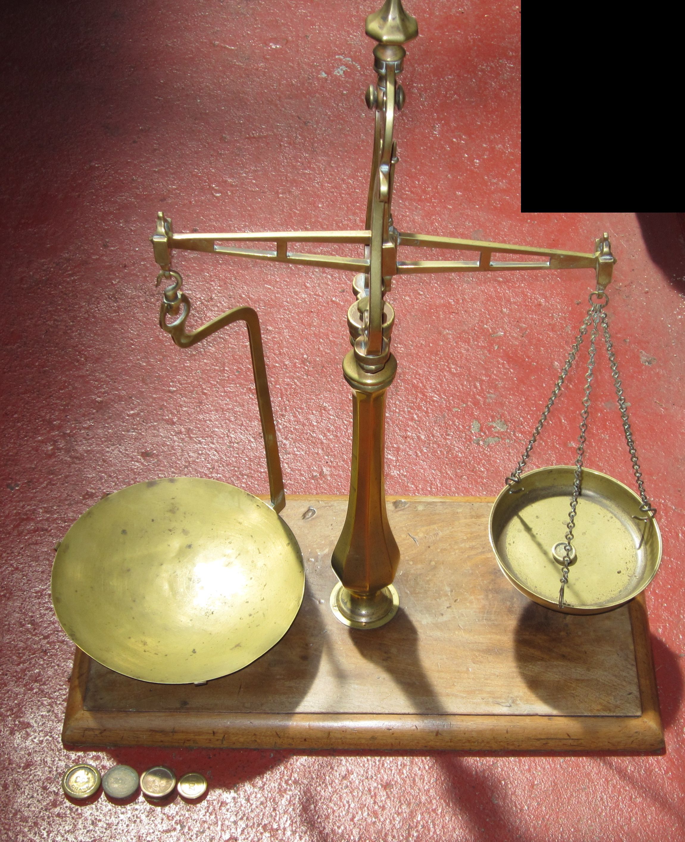 Bonhams Cars : An ornate brass shop counter balance,