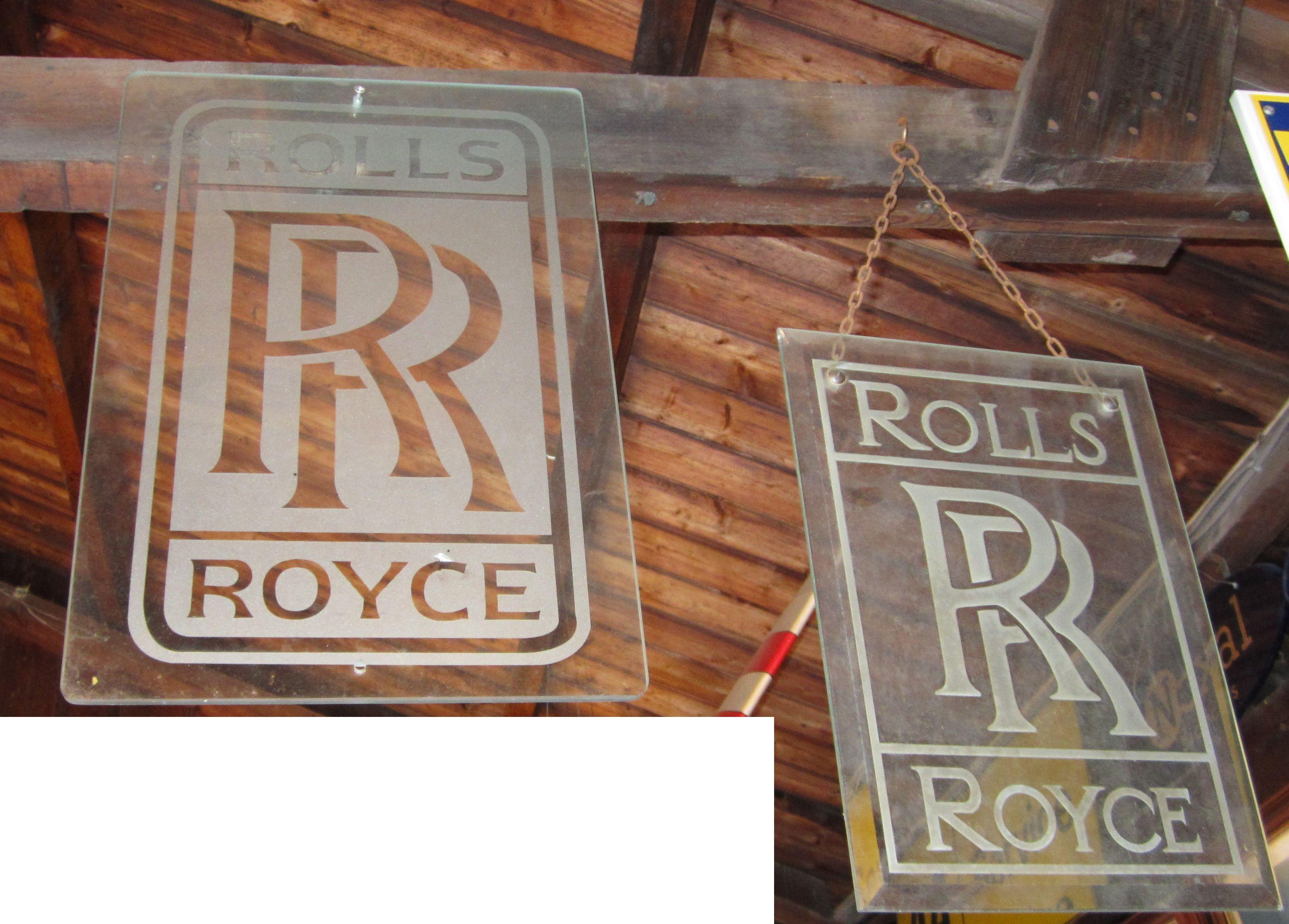 Bonhams Cars : Two Rolls-Royce hanging glass advertising signs,
