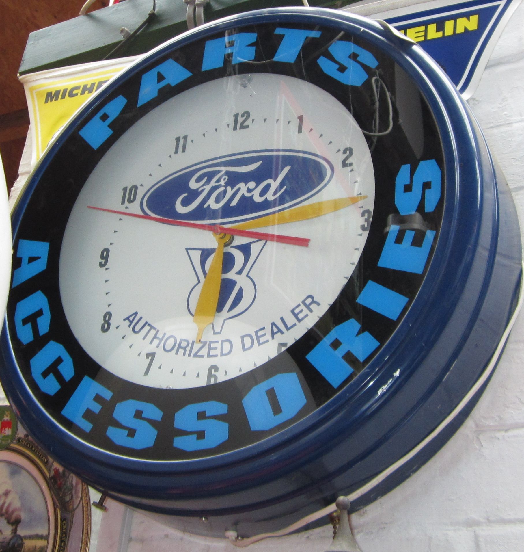 Bonhams Cars : Two Ford advertising garage clocks,