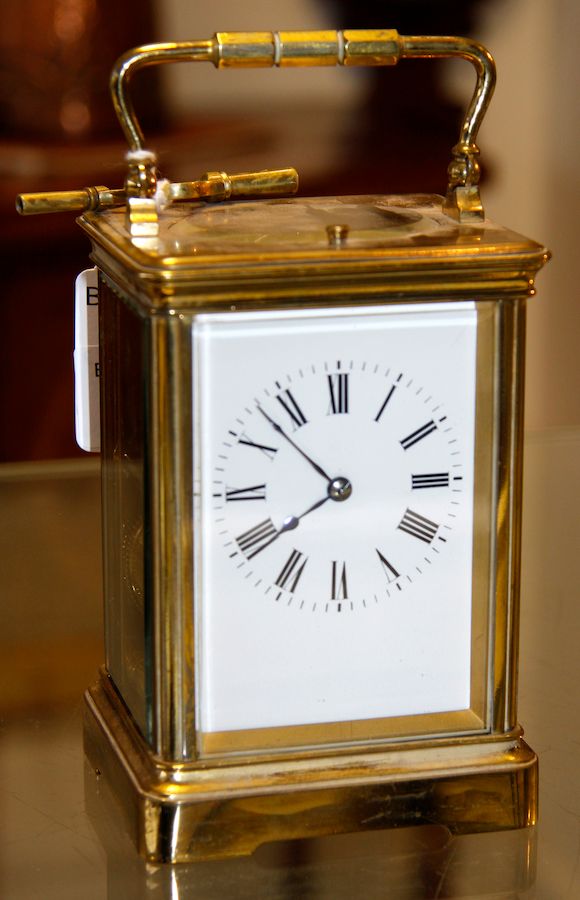 Bonhams : A serpentine fronted carriage clock with alarm Unsigned