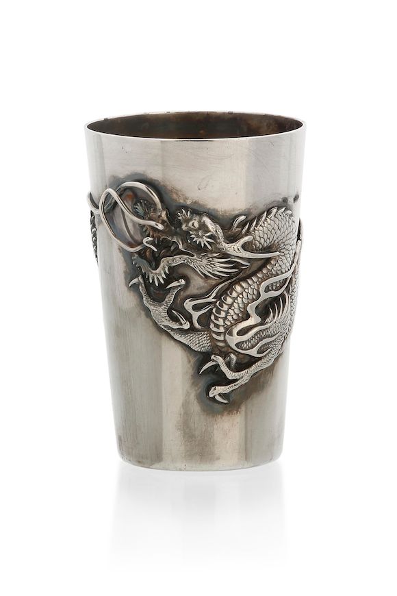 Bonhams : Two Chinese export silver beakers both signed to base