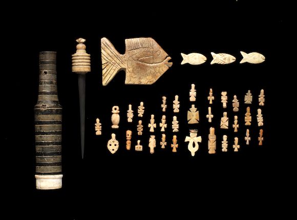 Bonhams : A group of Coptic bone pendants and fish a Coptic wood and ...