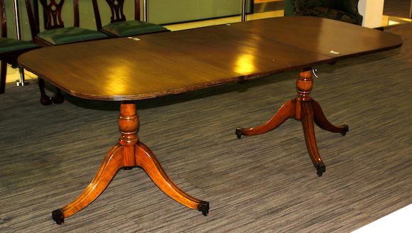Bonhams : A 19th Century bleached mahogany twin pillar dining table ...