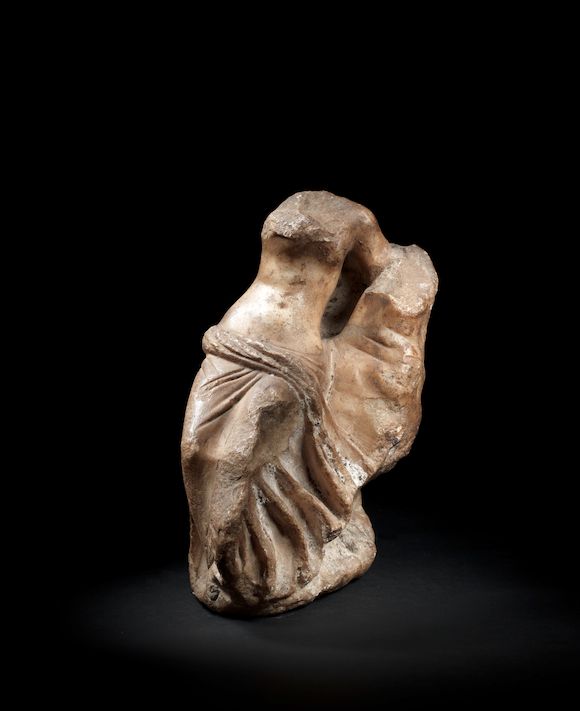 Bonhams : A Roman marble Nereid riding a Hippocamp