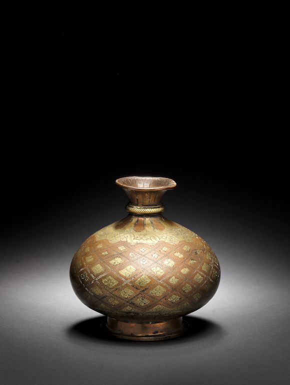 Bonhams : A copper-overlaid brass water Vase (lota) Tamil Nadu or Karnataka, South India, 17th ...
