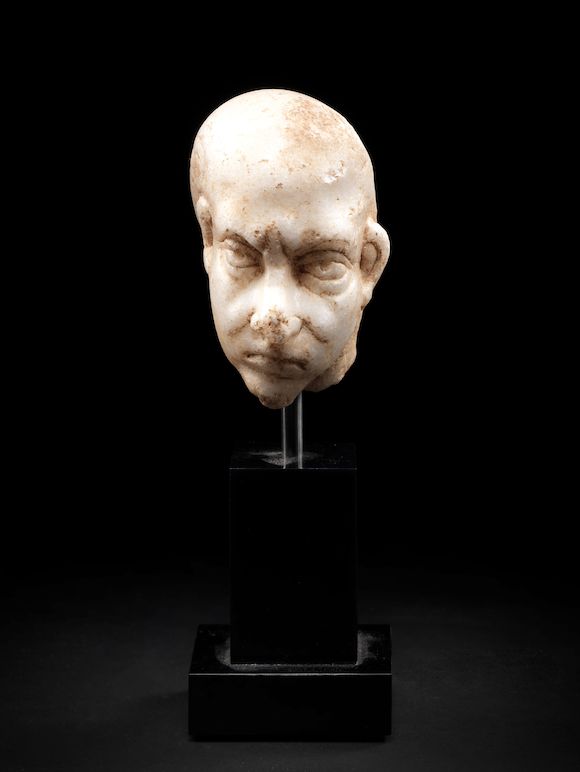 Bonhams : A Roman marble head of a grotesque