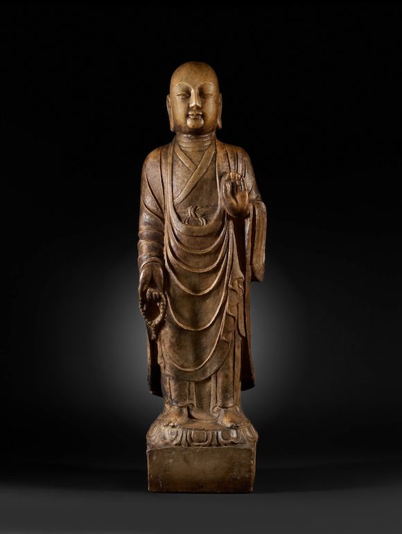 Bonhams : A rare and important marble figure of a Buddhist disciple ...