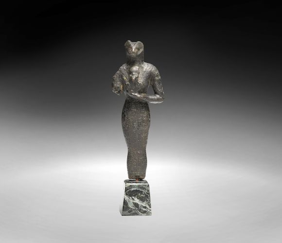 Bonhams : An Egyptian bronze figure of Bastet