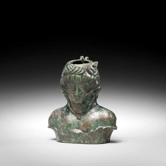 Bonhams : A Roman bronze balsamarium in the form of Antinous