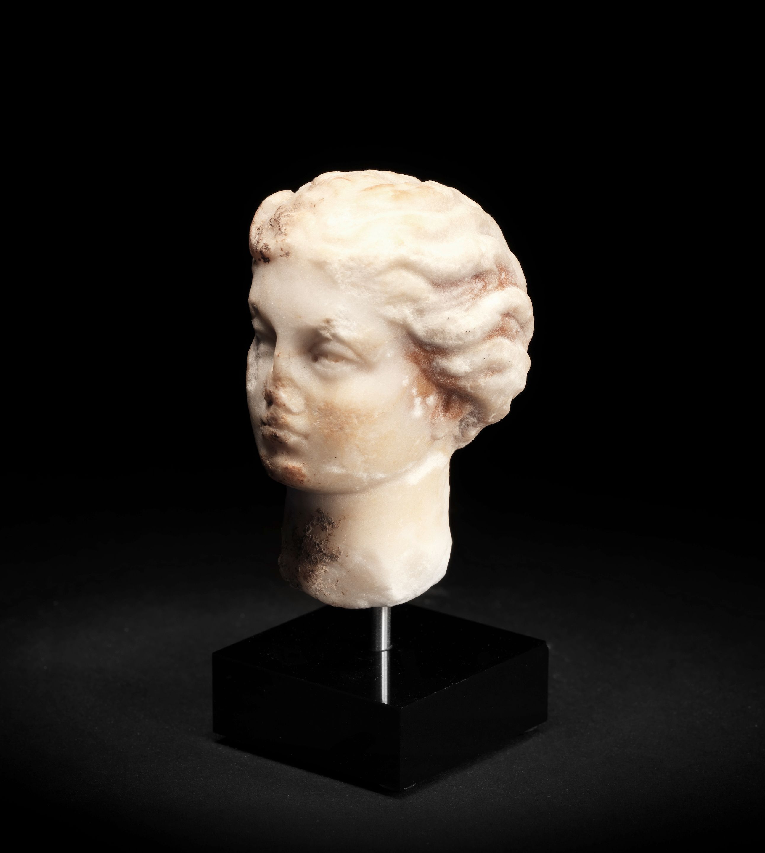 Bonhams : A small Roman marble female head