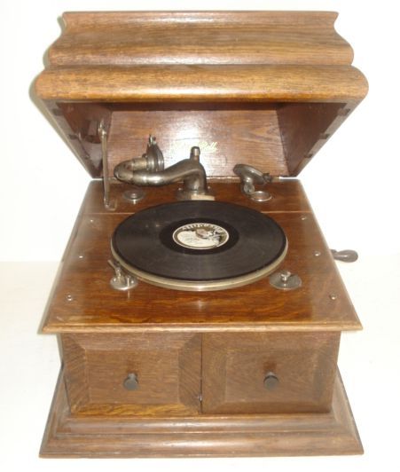Bonhams : An Edison-Bell oak cased wind-up gramophone.