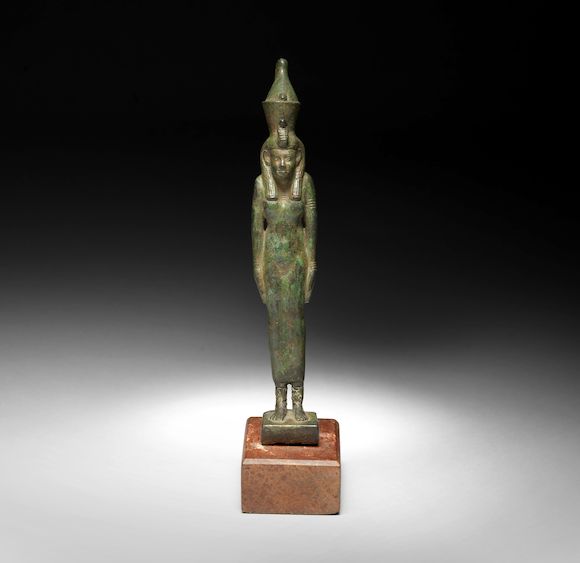 Bonhams : An Egyptian bronze figure of Mut