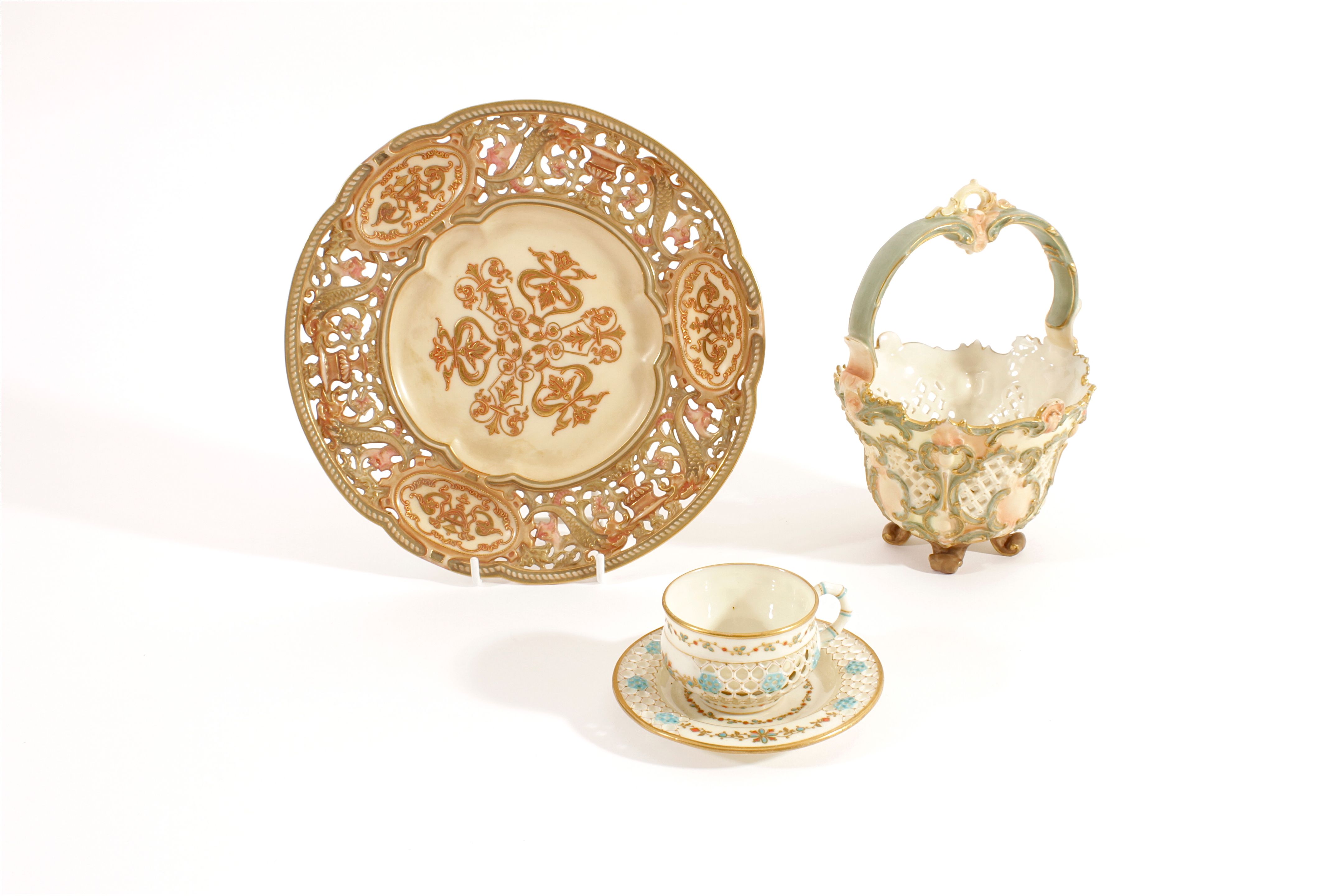 Bonhams : A Royal Worcester cabinet cup and saucer, a pierced plate and a basket, late 19th century