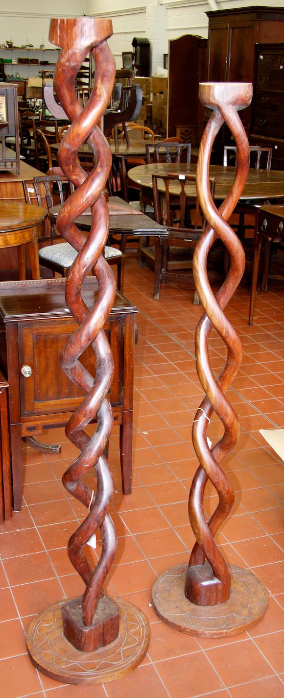 Bonhams : A pair of African carved mahogany double helix stands made in ...